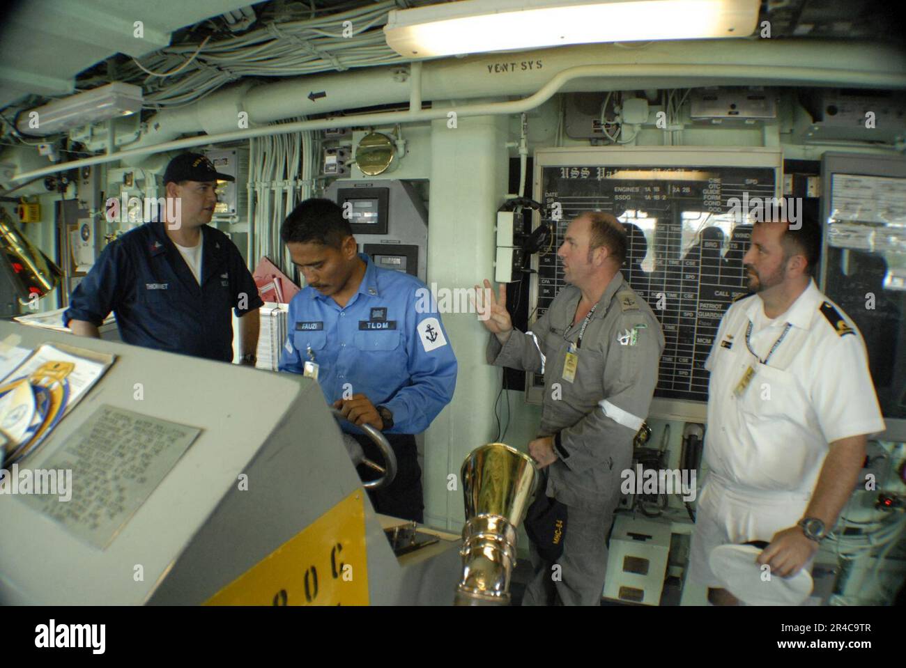 US Navy Quartermaster 1st Class assigned to the mine warfare ship USS ...