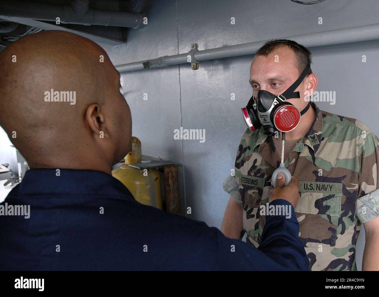US Navy Aviation Ordnanceman 1st Class puffs smoke at Culinary ...