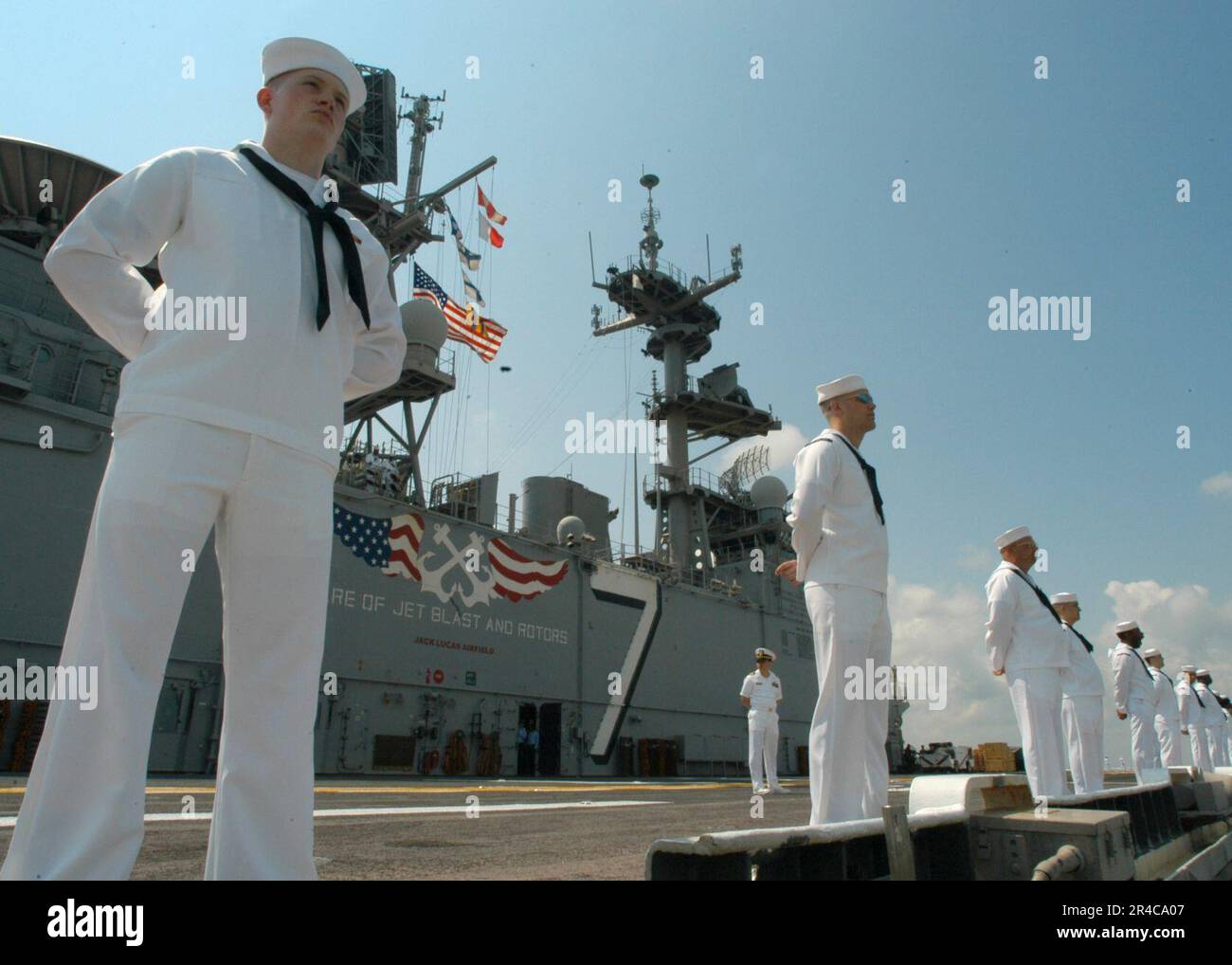 US Navy Sailors aboard the amphibious assault ship USS Iwo Jima (LHD 7 ...