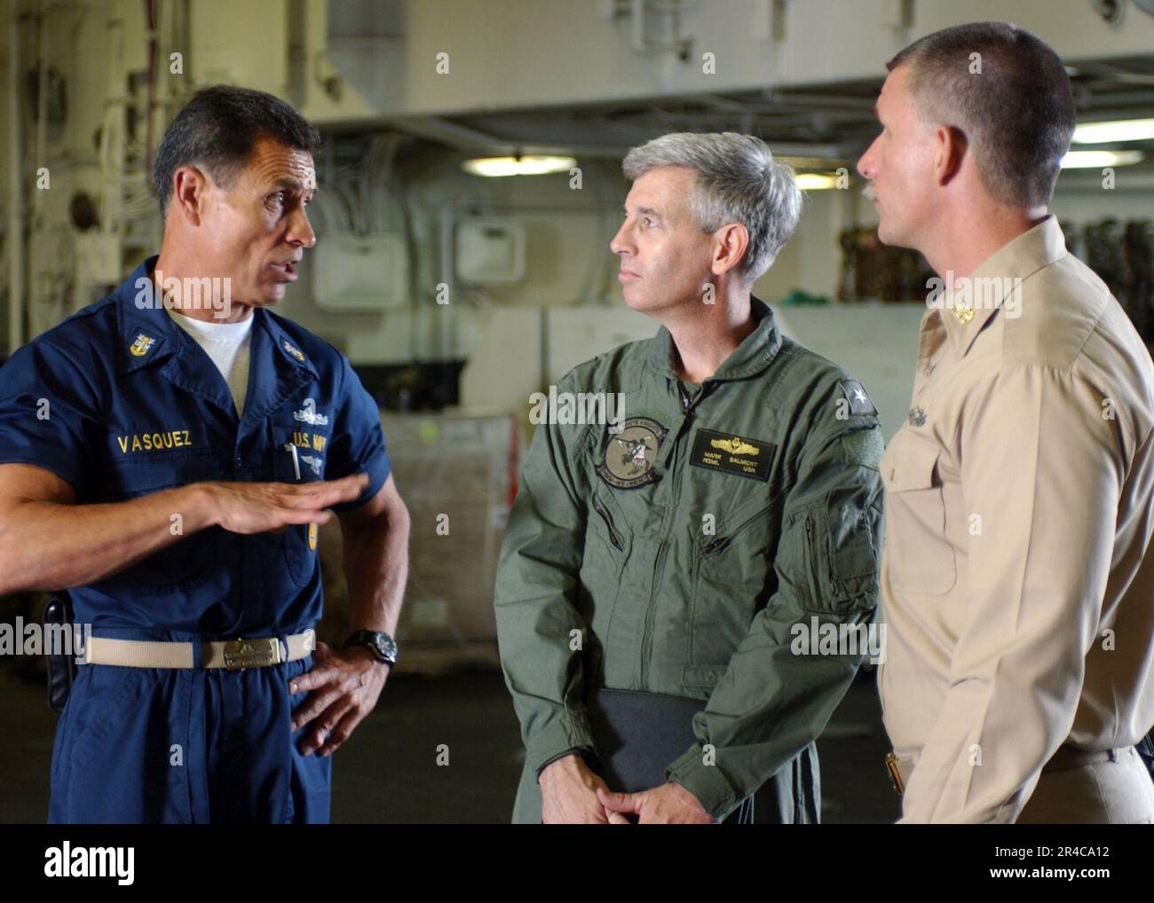 US Navy Command Master Chief Amphibious Group Three, and Command Master ...