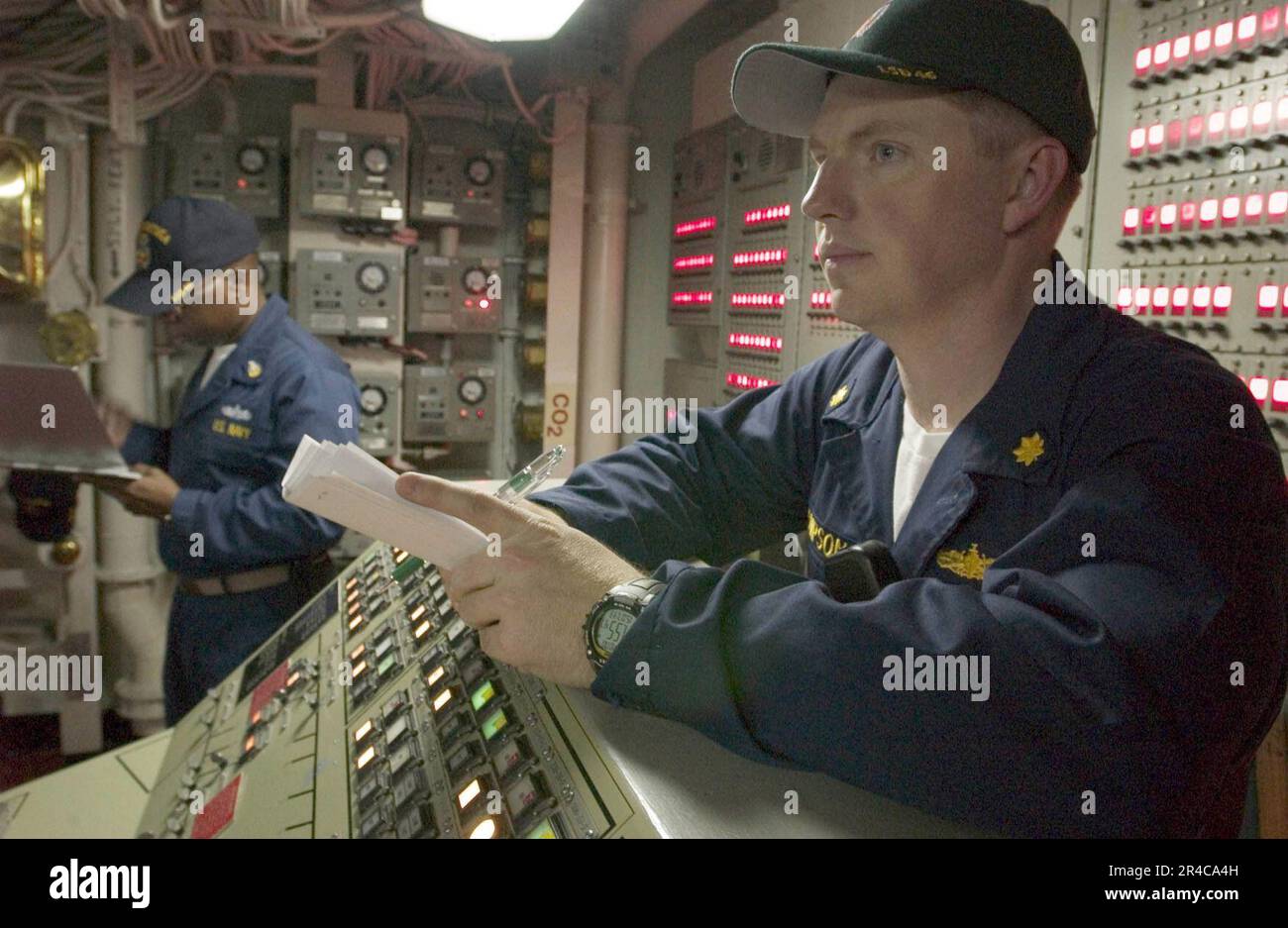 US Navy Executive Officer USS Tortuga (LSD 46) Lt. Cmdr. observes a ...