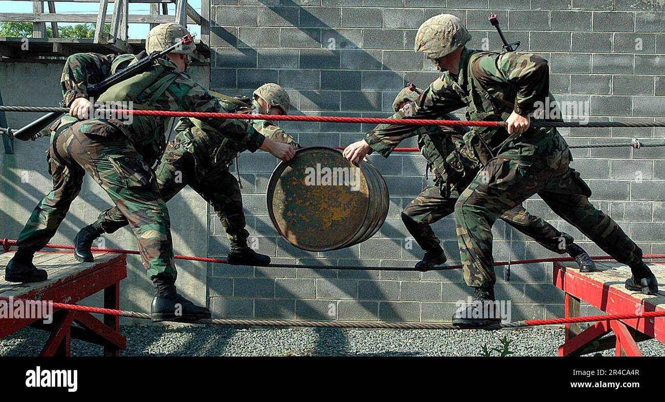 US Navy A U.S. Naval Academy Midshipmen work to transfer cargo in the ...