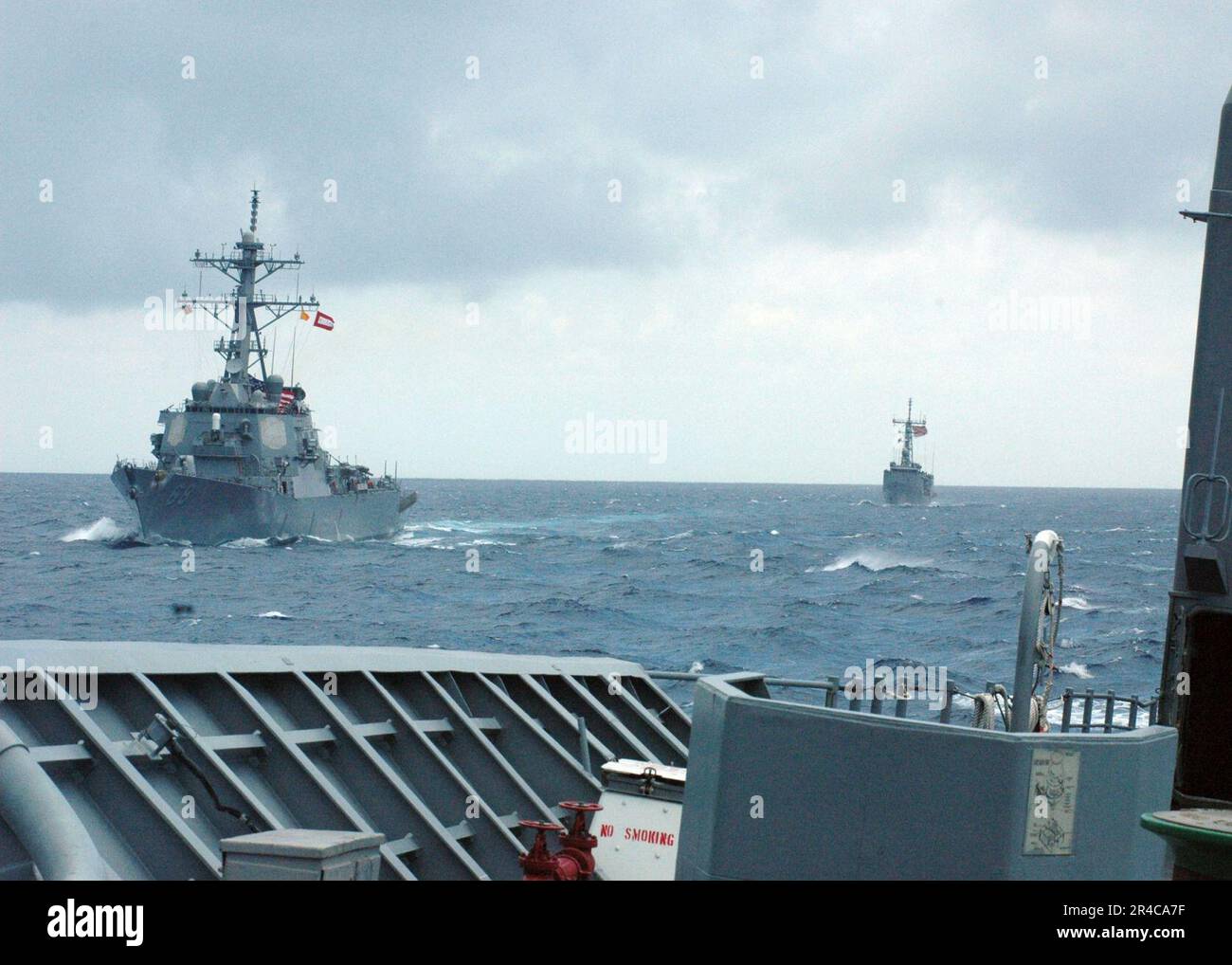 US Navy The guided-missile destroyer USS The Sullivans (DDG 68) and the ...