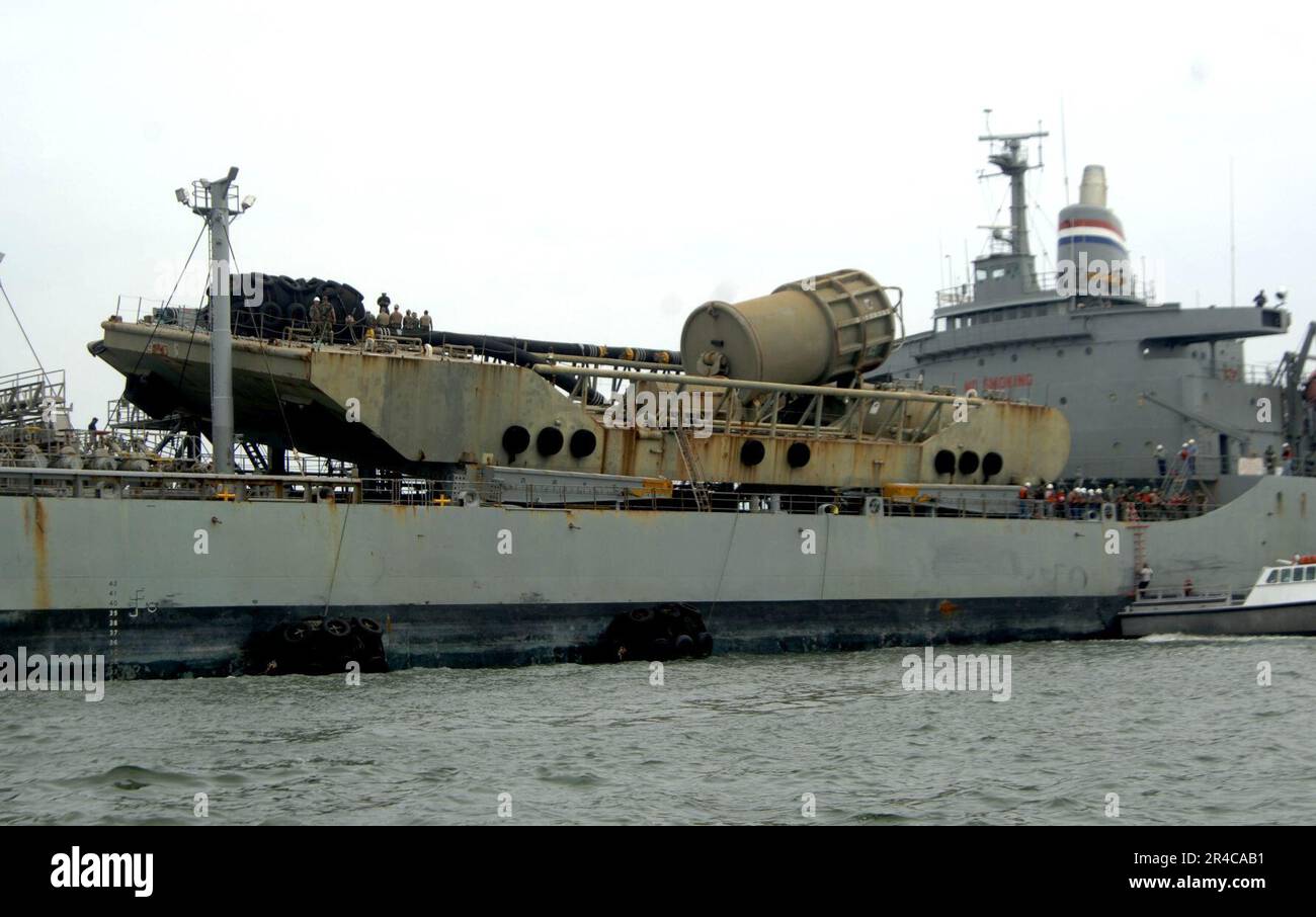 US Navy The crew aboard the Transport Tanker SS Chesapeake is preparing ...
