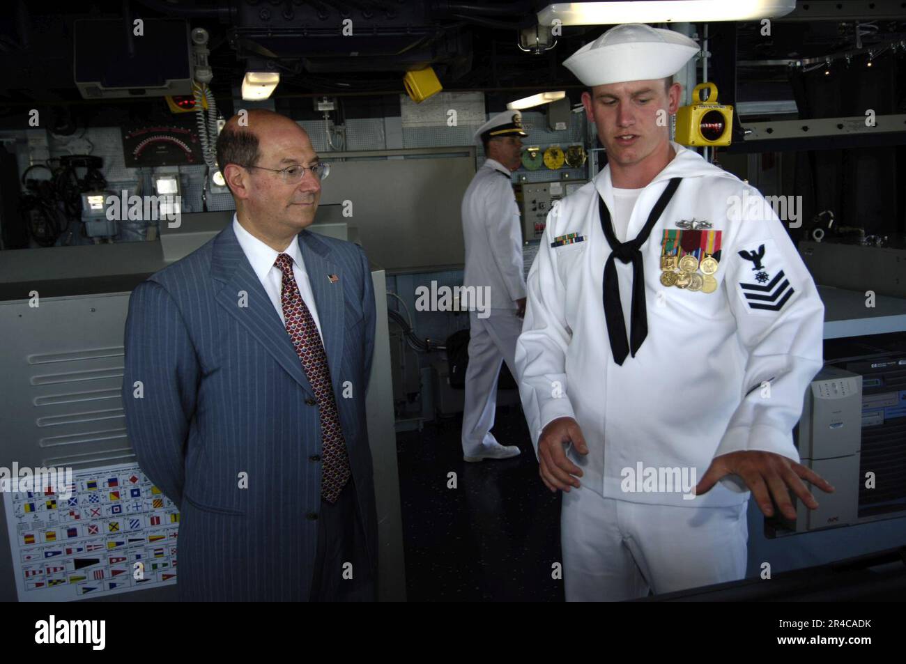 US Navy Quartermaster 1st Class gives Secretary of the Navy (SECNAV ...