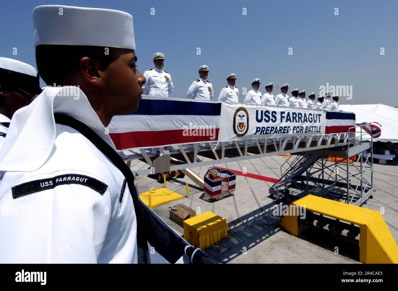 US Navy Seaman Apprentice left, mans the ship, officially bringing the ...