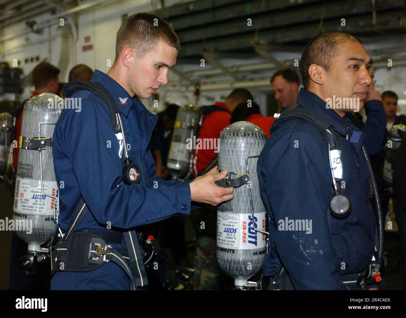 US Navy Electronics Technician 3rd Class checks Electronics Technician ...