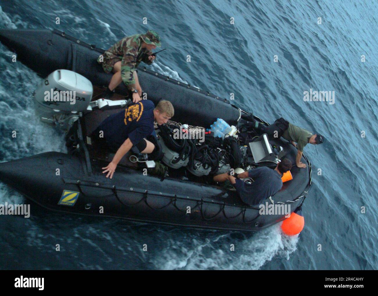 US Navy Members assigned to Explosive Ordinance Disposal Mobile Unit ...