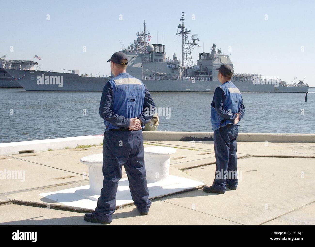 US Navy Quartermaster 2nd Class and Boatswain's Mate 3rd Class stand-by ...