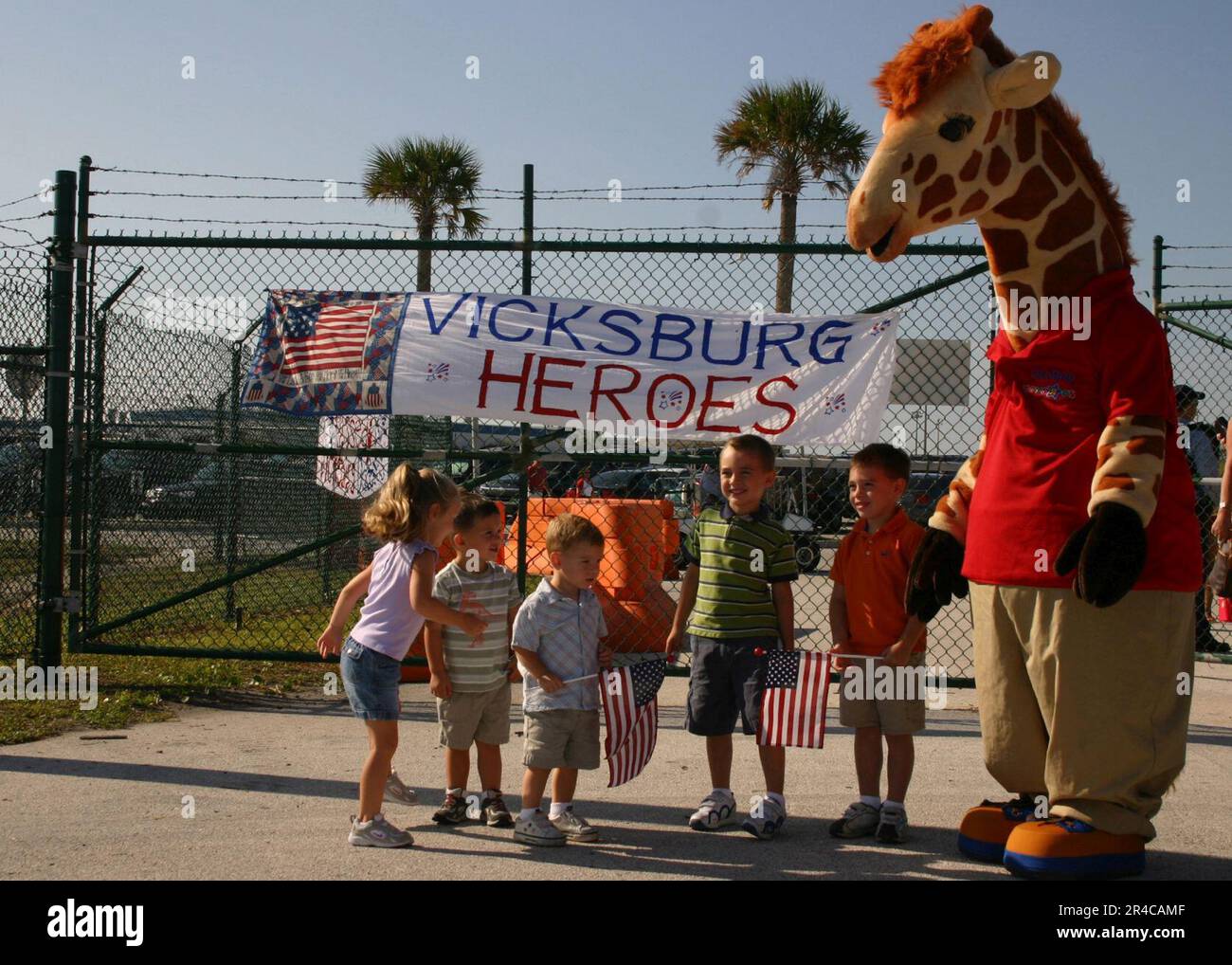 US Navy Toys R' Us mascot Geoffrey entertains family and friends during ...