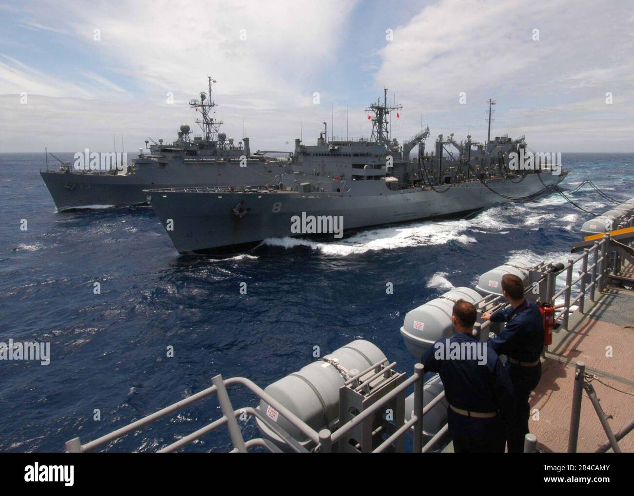 US Navy Amphibious assault ship USS Iwo Jima (LHD 7) pulls along side ...