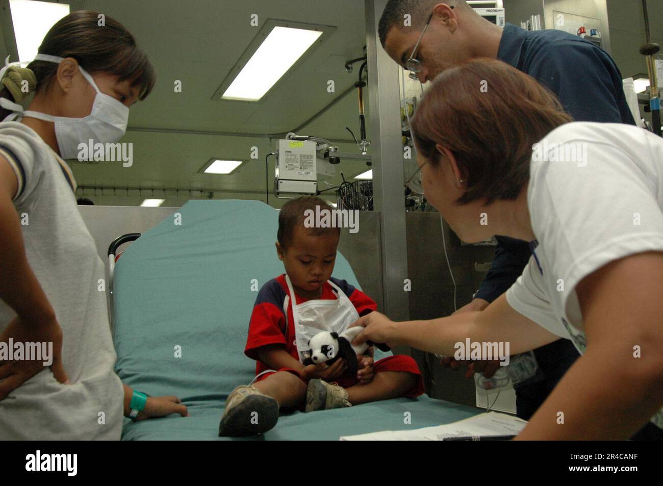 US Navy Hospital Corpsman and a Medical Treatment Facility member ...