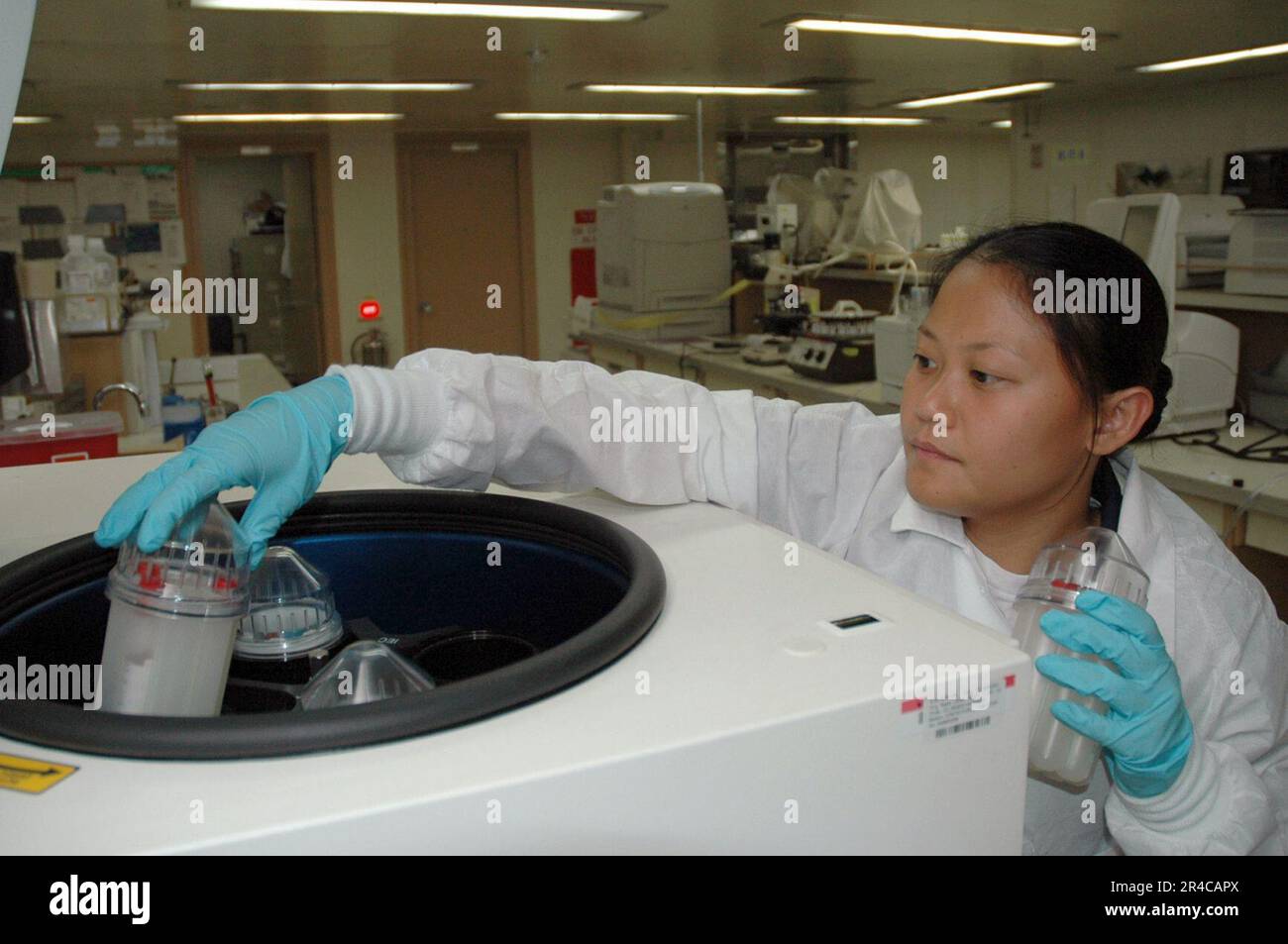 US Navy Navy Hospital Corpsman test a patient's blood in the laboratory ...