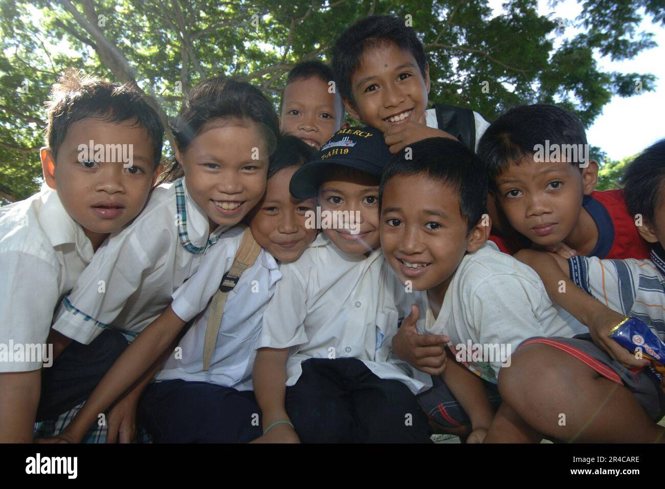 US Navy A group of Filipino children gather together for a picture ...
