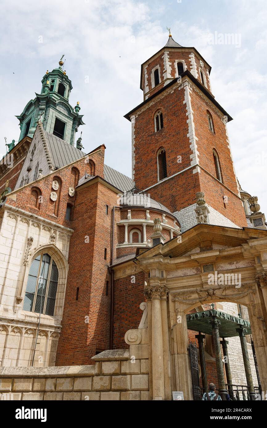 A majestic and imposing tower with a detailed clock perched atop it ...