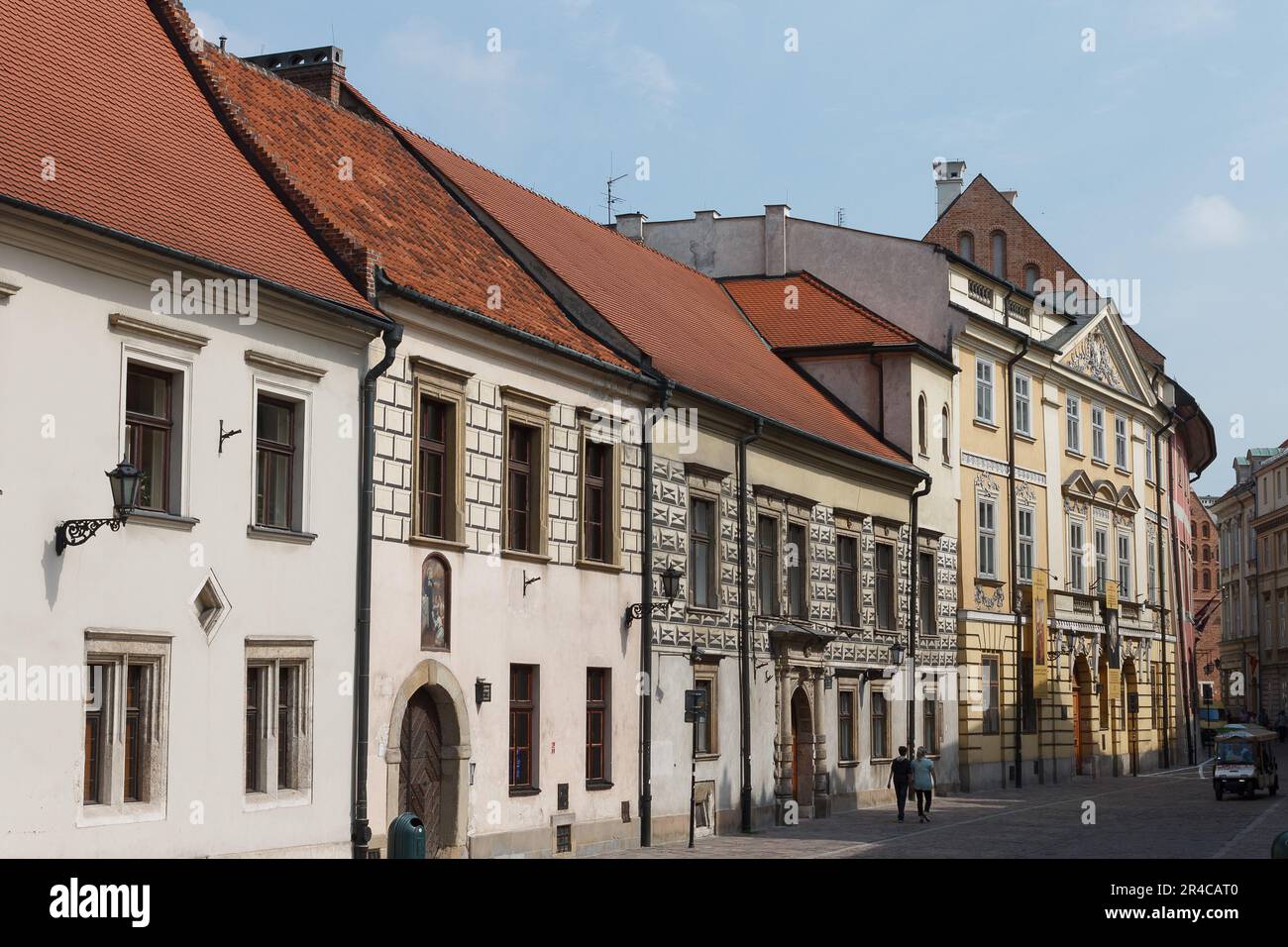 An aerial view of a bustling city skyline featuring an array of tall ...