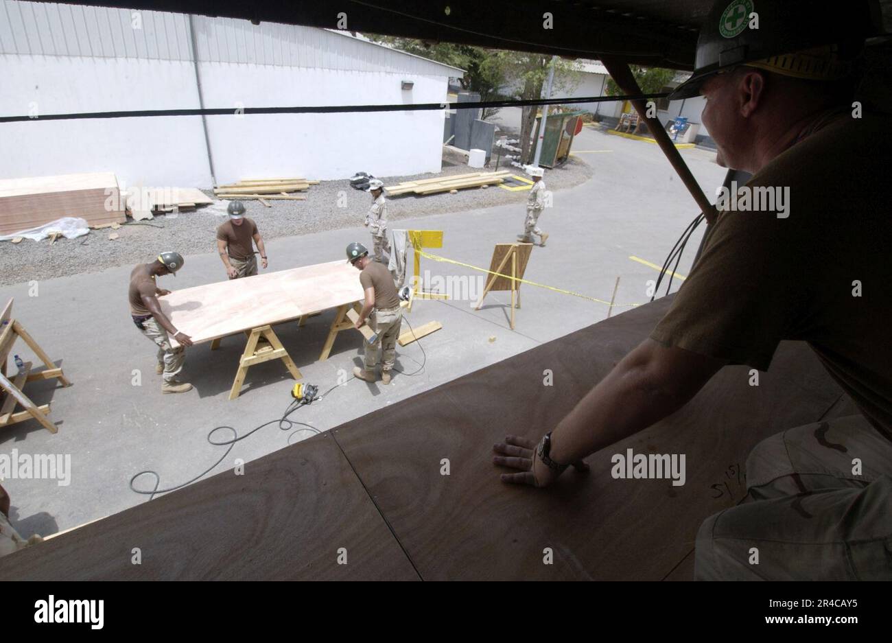 US Navy Utilitiesman 2nd Class waits for fellow Seabees from Naval ...