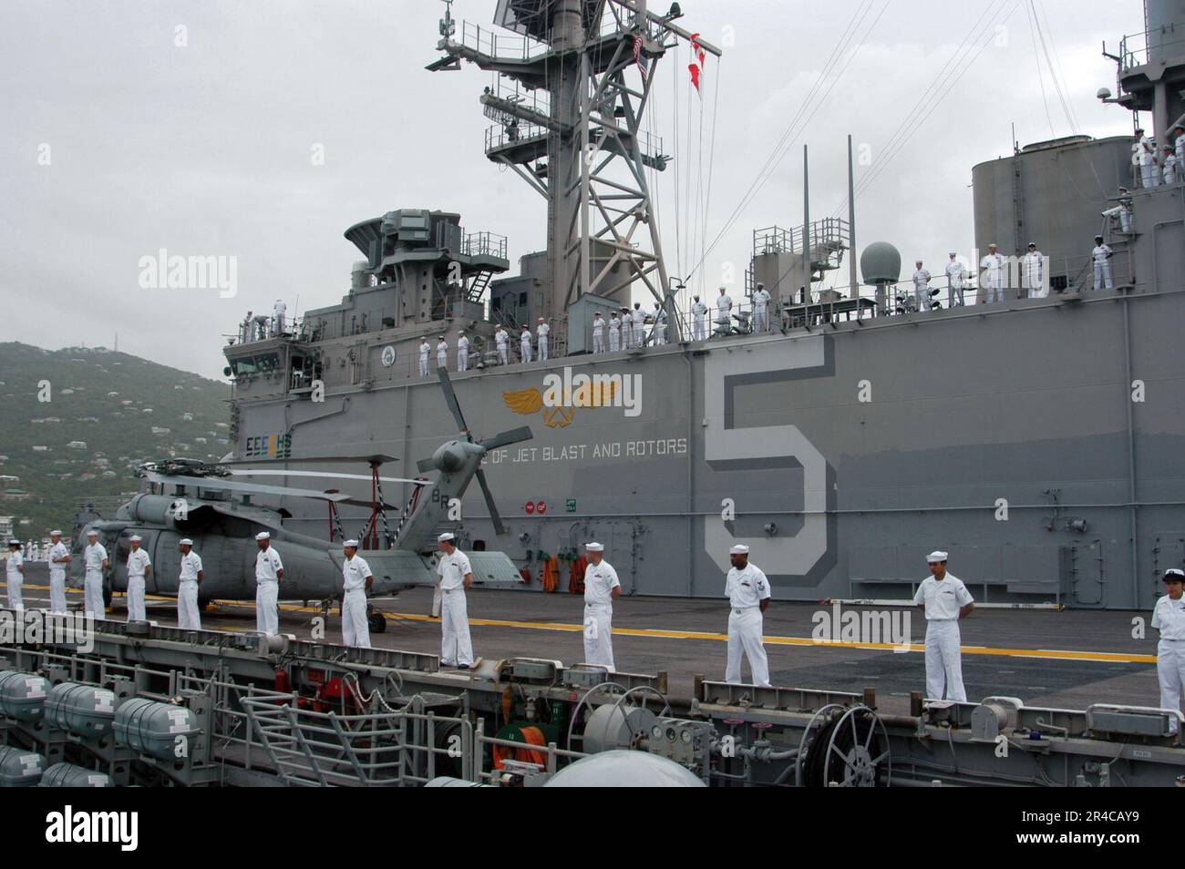 US Navy Sailors aboard the amphibious assault ship USS Bataan (LHD 5 ...