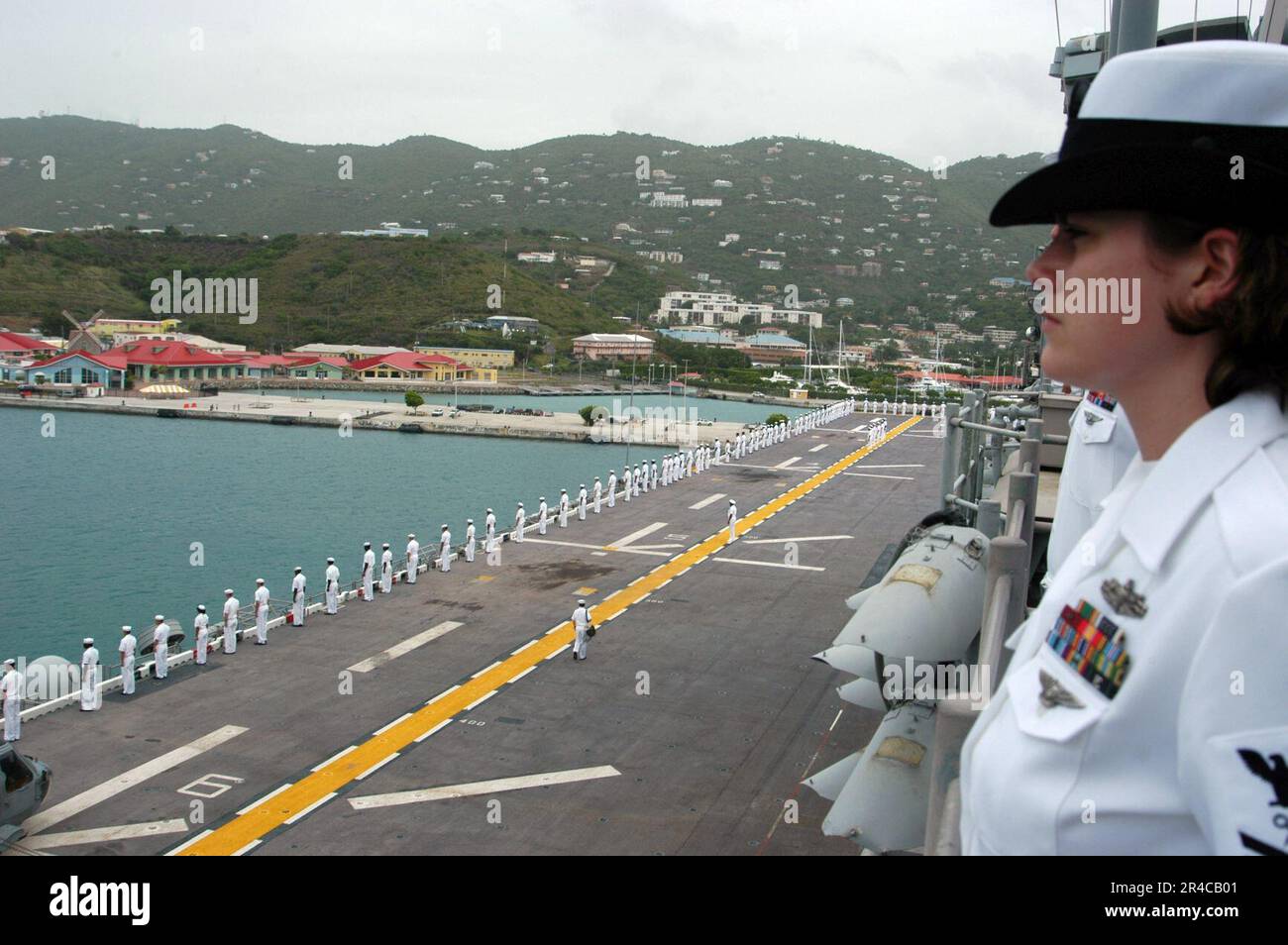 US Navy Sailors aboard the amphibious assault ship USS Bataan (LHD 5 ...