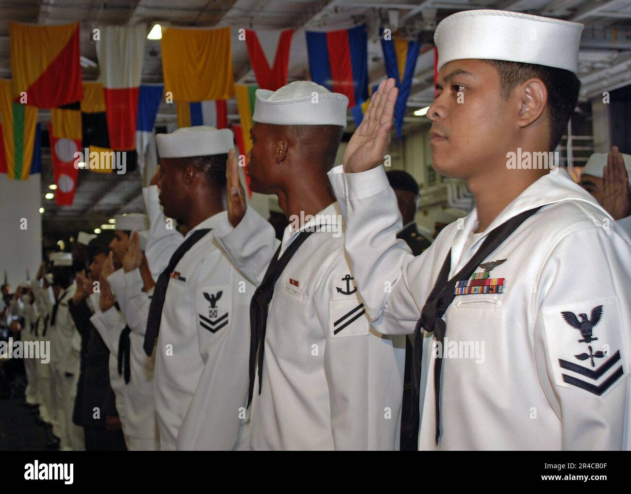 US Navy U.S. Navy Sailors take the Oath of Citizenship given by U.S ...