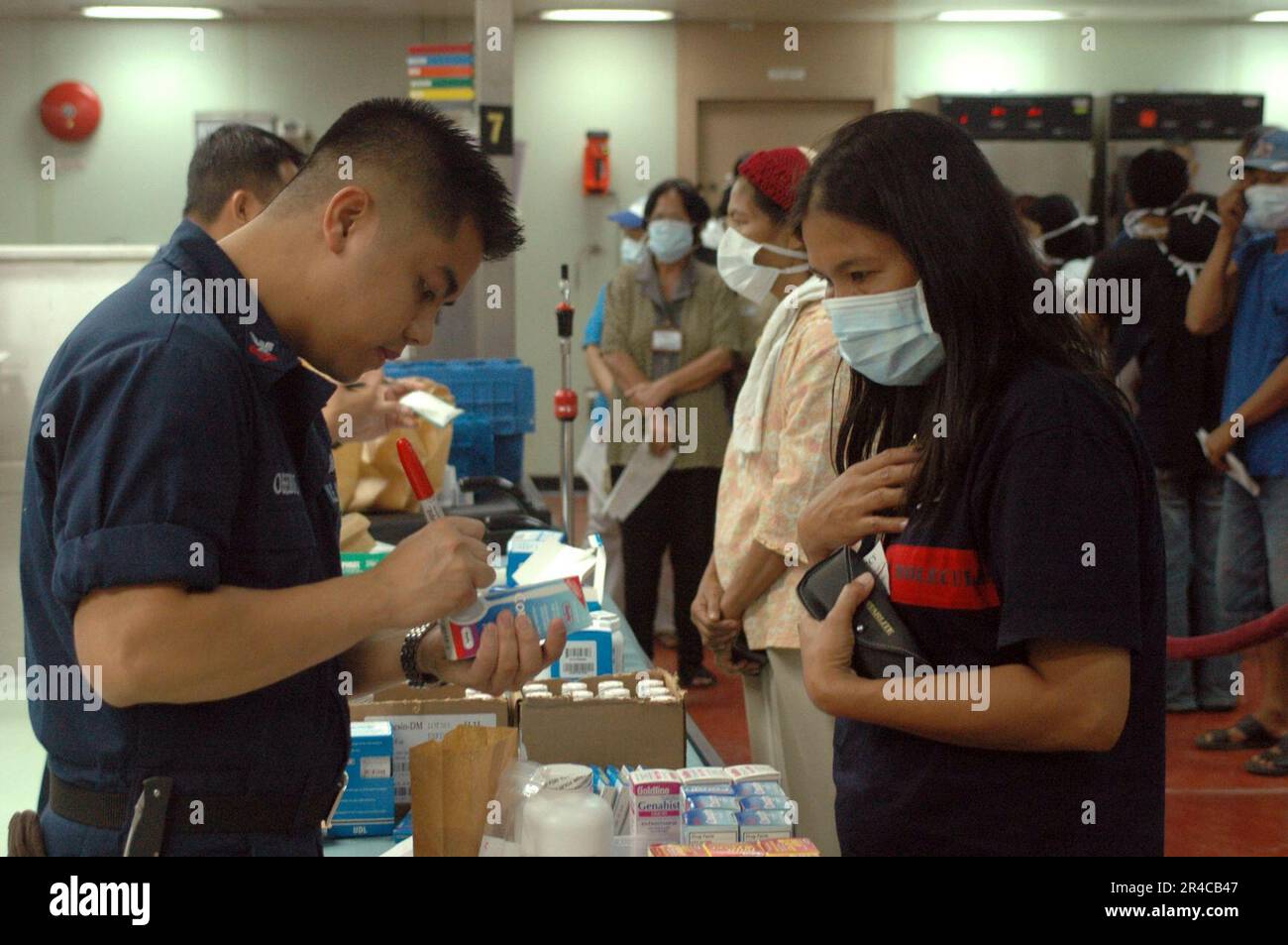 US Navy Navy Hospital Corpsman 2nd Class explains medication directions ...