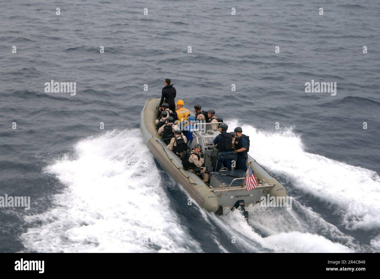 US Navy The Visiting, Boarding, Search and Seizure Team from the guided ...
