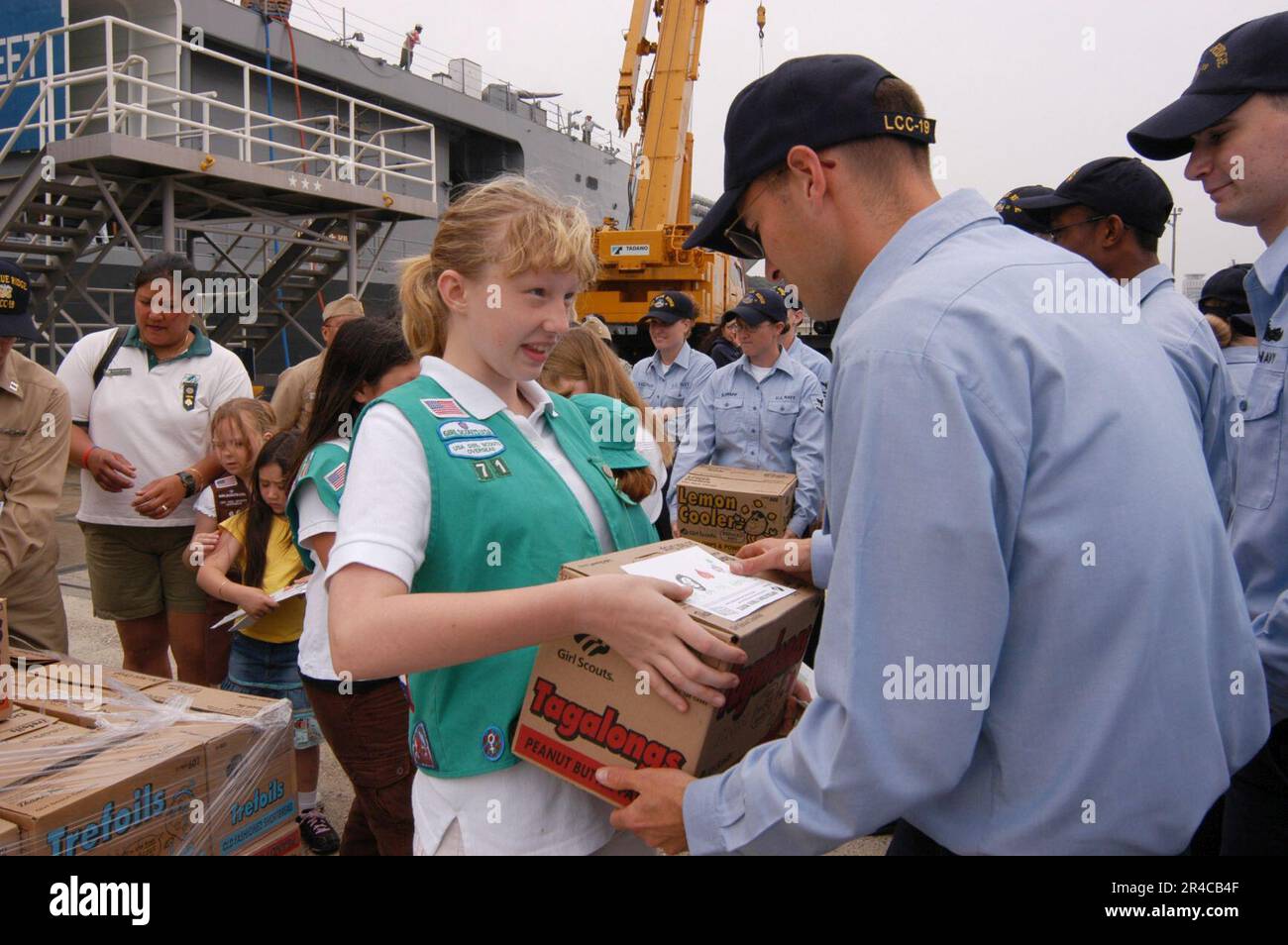 US Navy A member of Girl Scout Junior Troop 71 personally delivers a ...