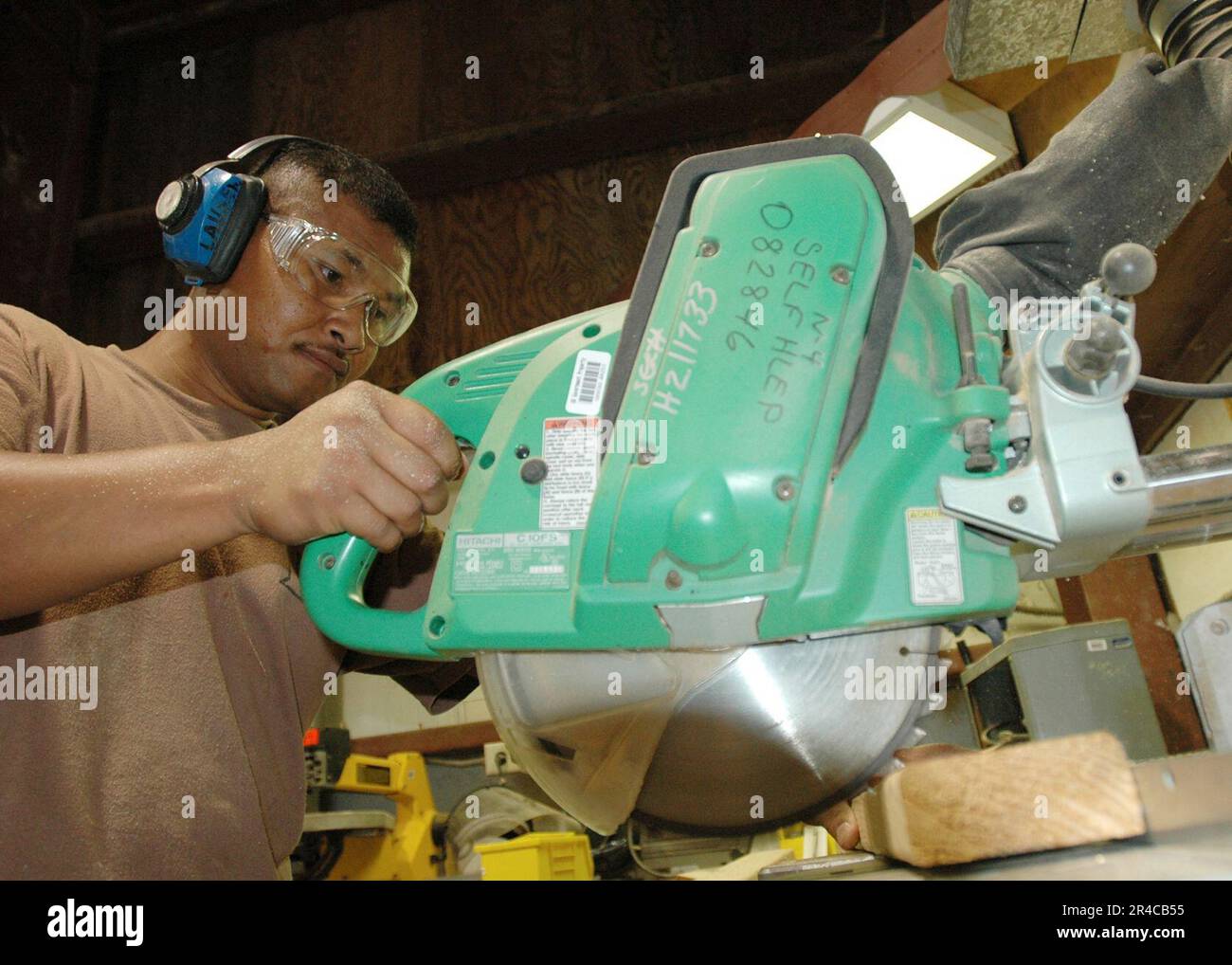 US Navy Petty Officer 2nd Class a Seabee assigned to Naval Facilities ...