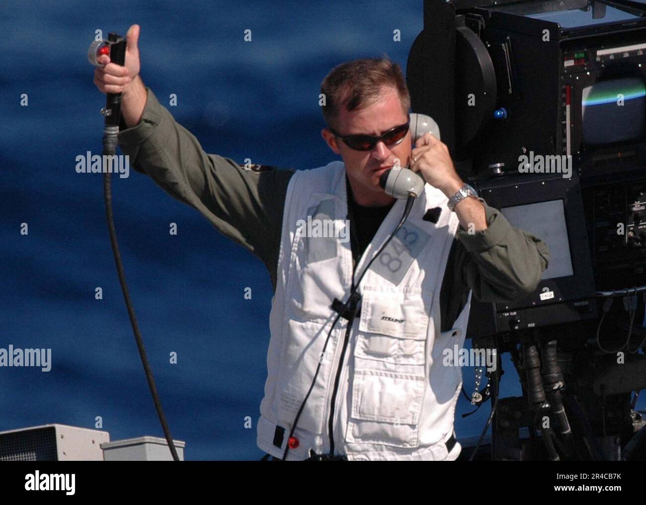 US Navy A Landing Signal Officer aboard the Nimitz-class aircraft ...