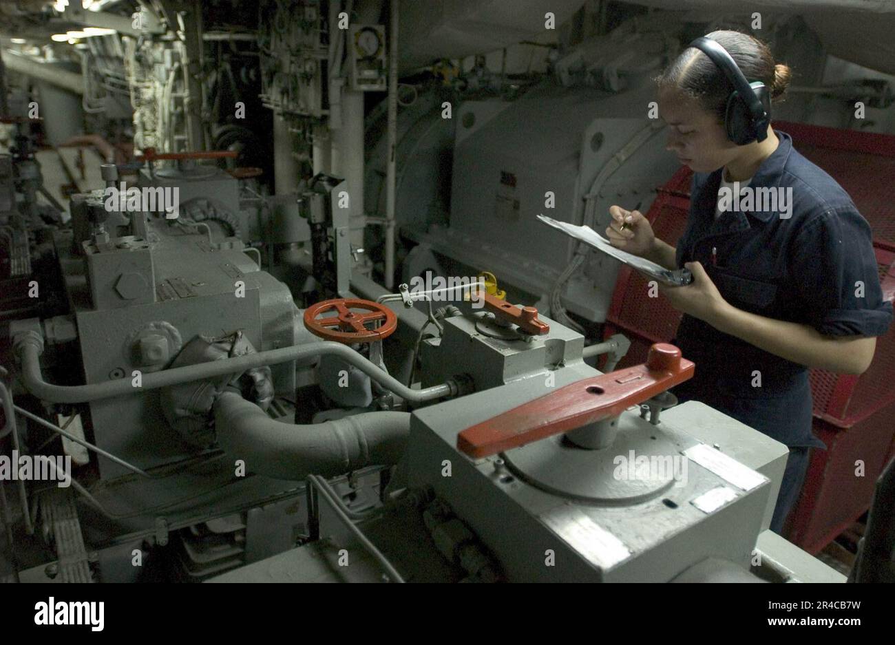 US Navy Engineman Fireman documents engineering checks in the number ...