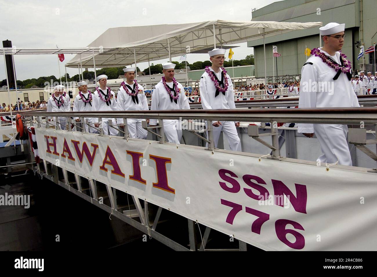 US Navy Sailors assigned to the Virginia-class nuclear attack submarine ...