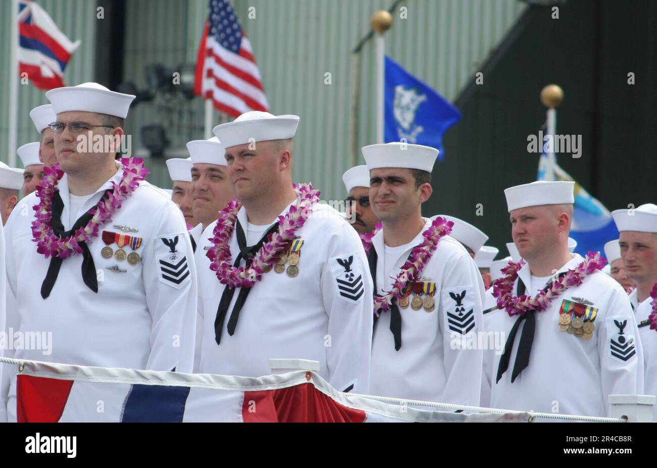 US Navy Sailors assigned to the Virginia-class nuclear attack submarine ...