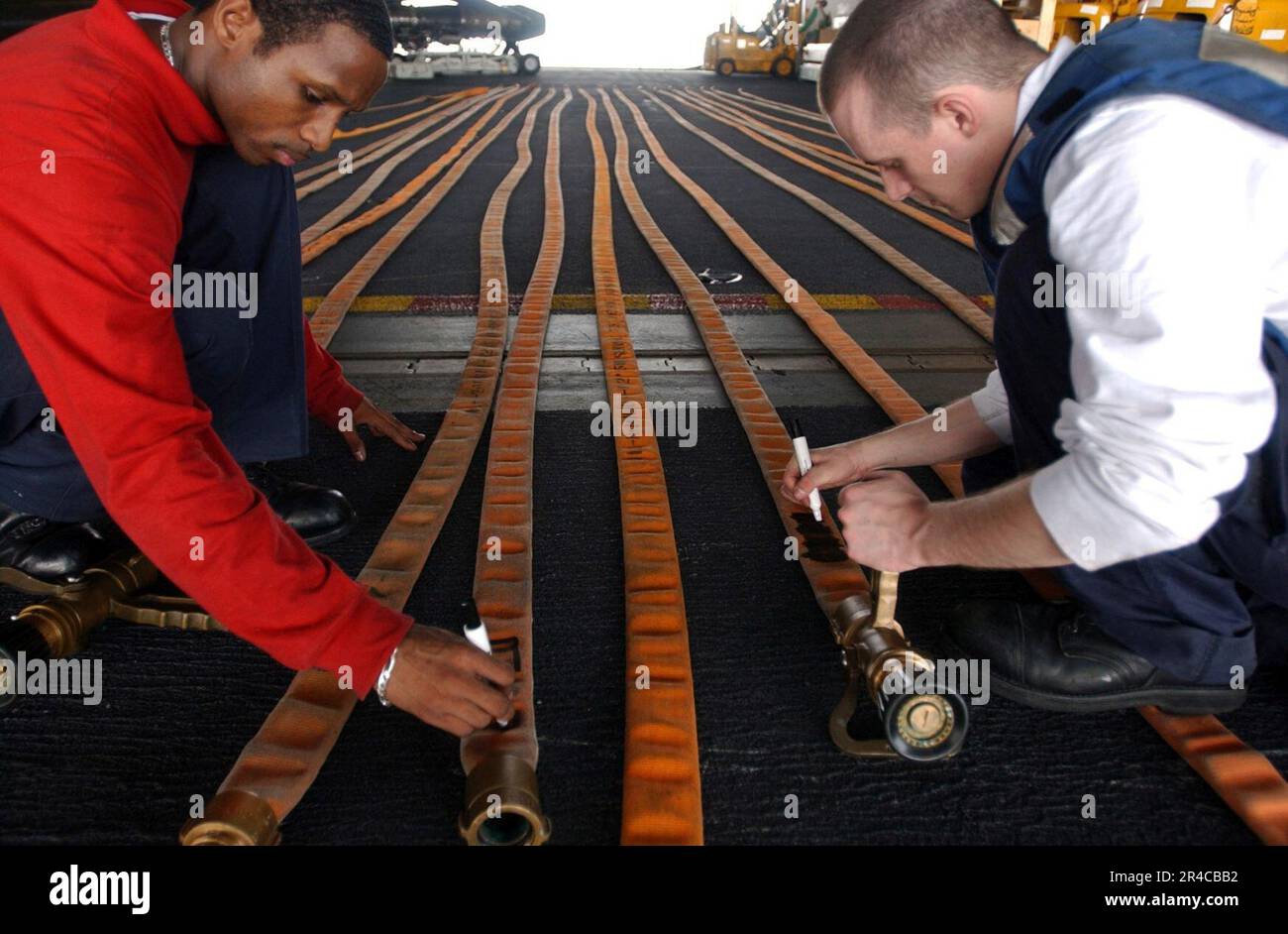 US Navy Aviation Boatswain's Mate 3rd Class left, and Aviation ...