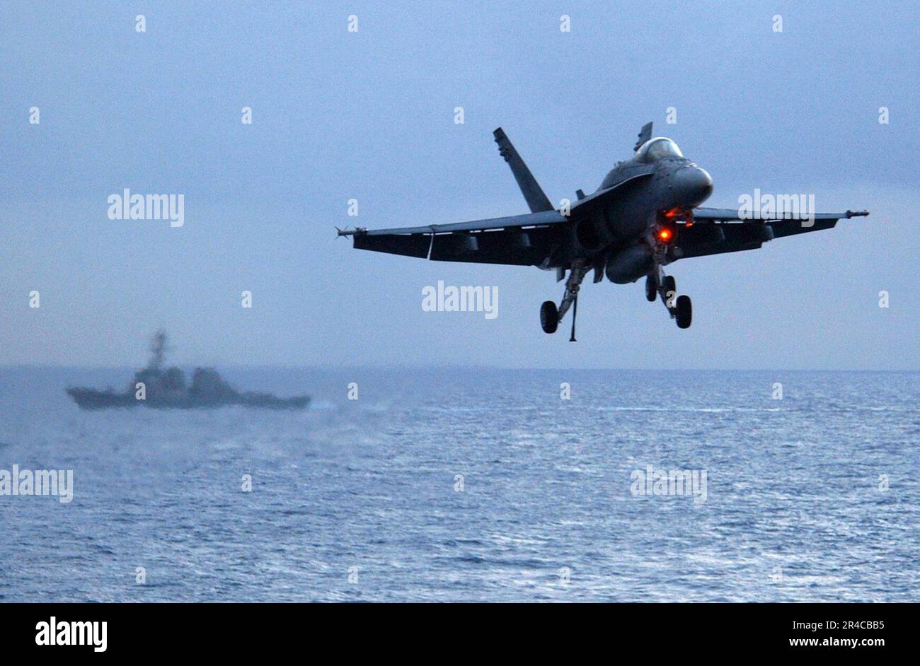 US Navy An F-A-18C Hornet makes a final approach for an arrested ...
