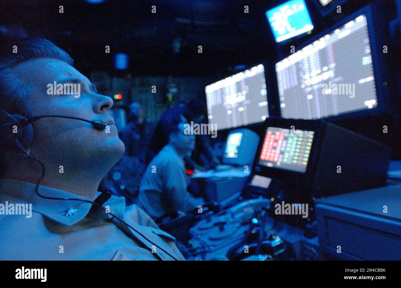 US Navy USS Ronald Reagan (CVN 76) Air Operations Officer, Cmdr. stands ...