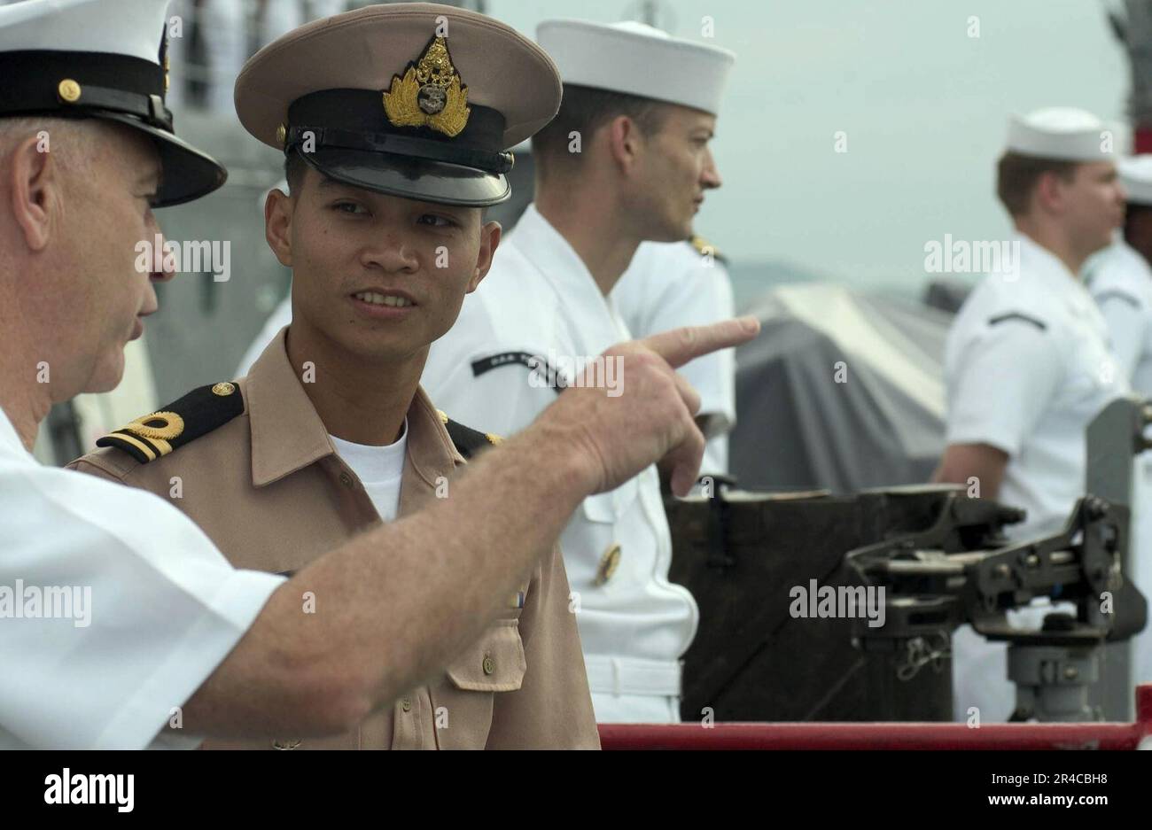 US Navy Command Master Chief talks with Royal Thai Navy liaison officer ...