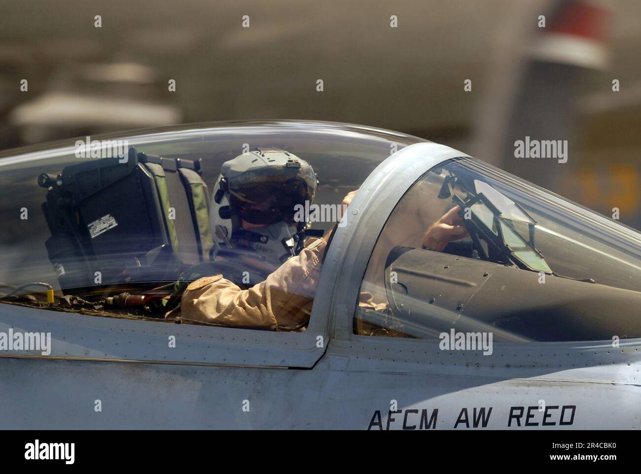 US Navy A pilot stands by at the ready for a signal that it's his turn ...