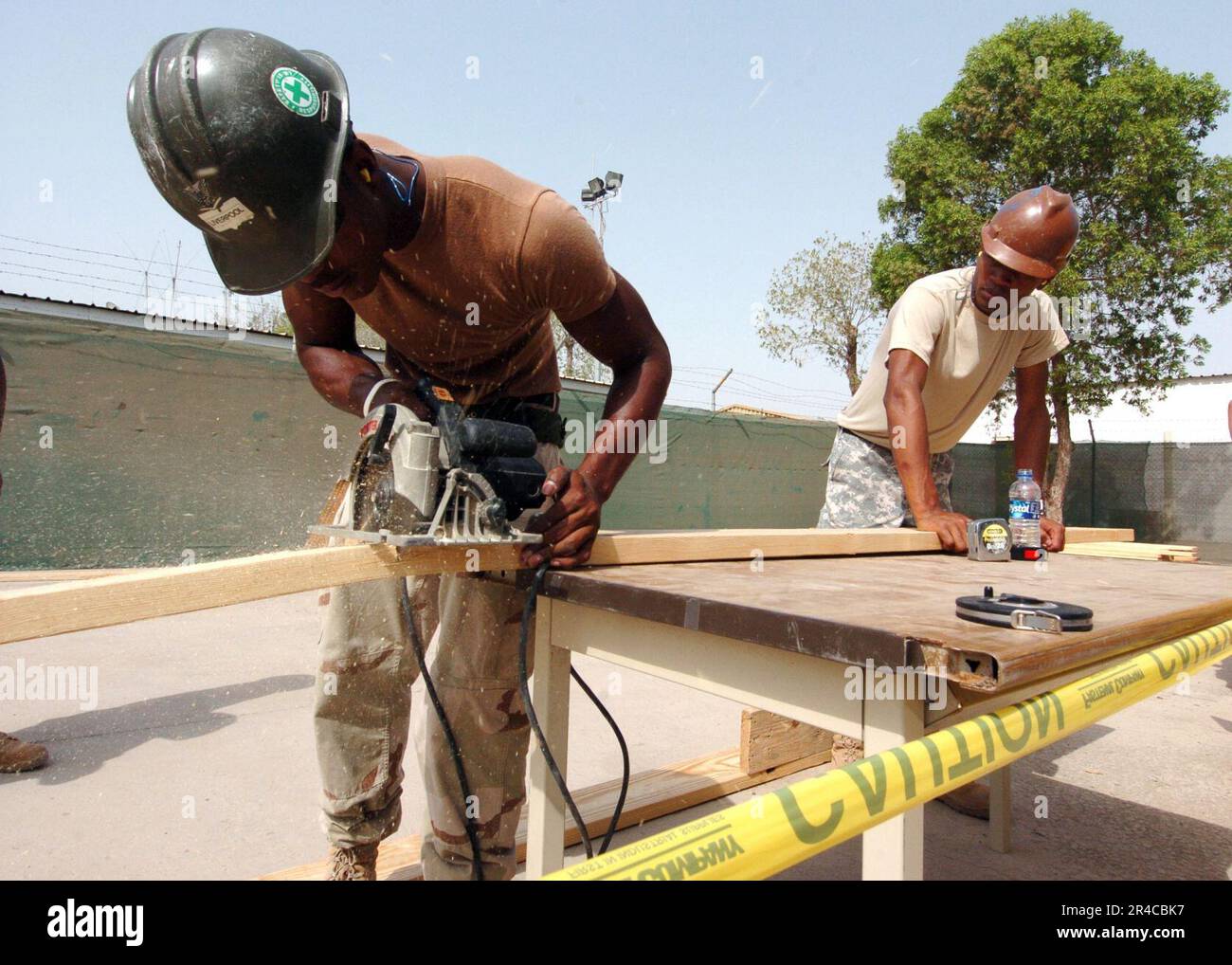 US Navy Builder 3rd Class assigned to Naval Mobile Construction ...
