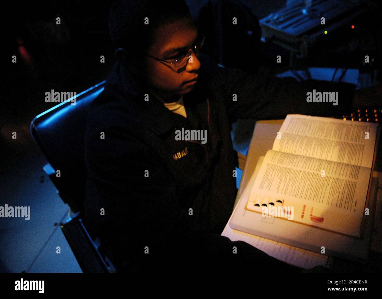 US Navy Operation Specialist 2nd Class stands watch in the Combat ...