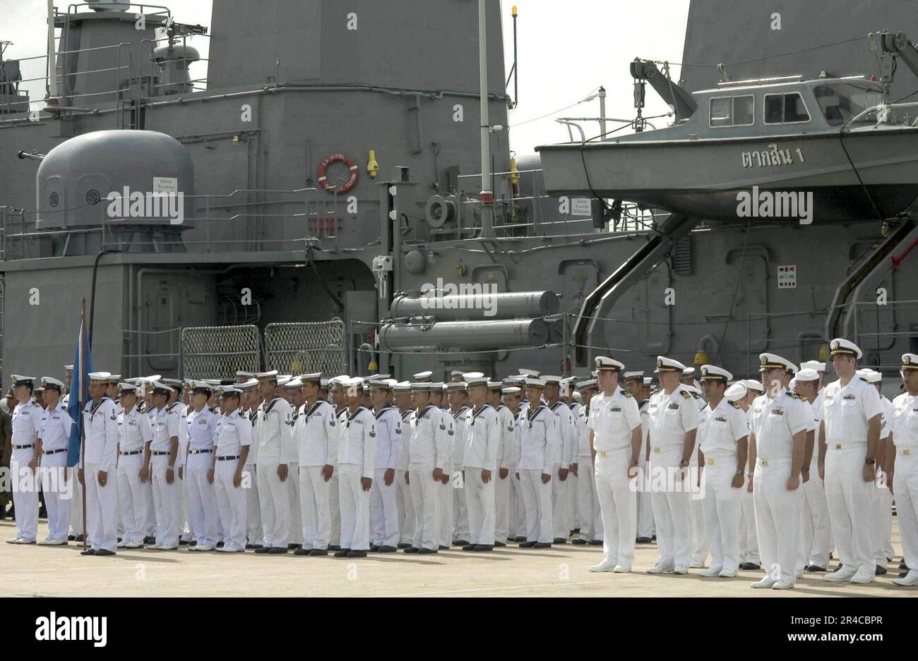 US Navy Royal Thai Navy (RTN) and U.S. Navy Sailors stand in formation ...
