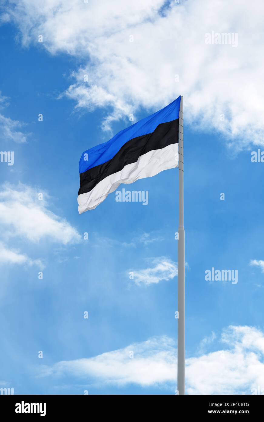 Flag of Estonia is waving in front of blue sky and clouds Stock Photo ...