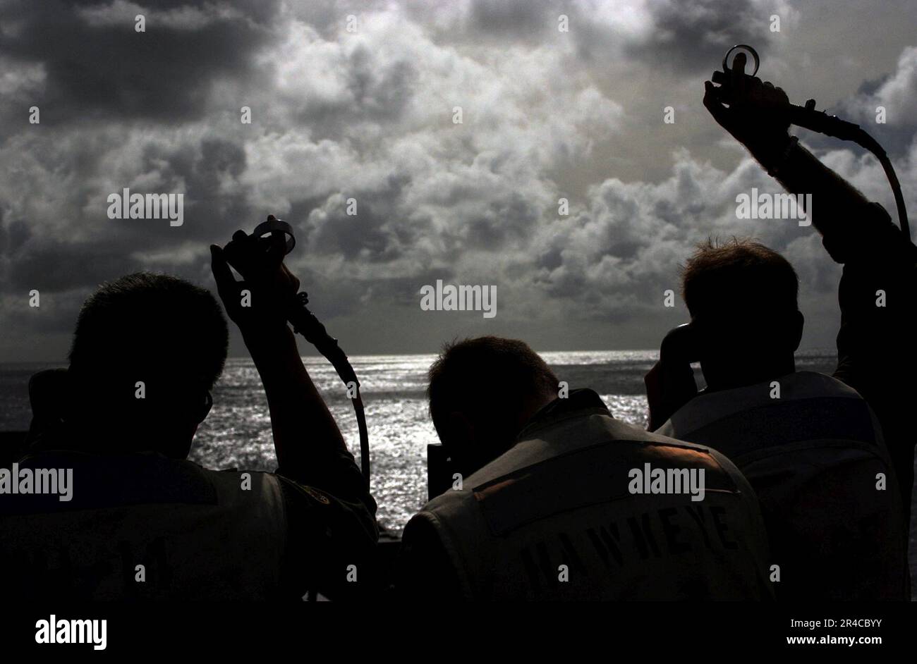 US Navy With an aircraft on approach, the landing signal officers ...