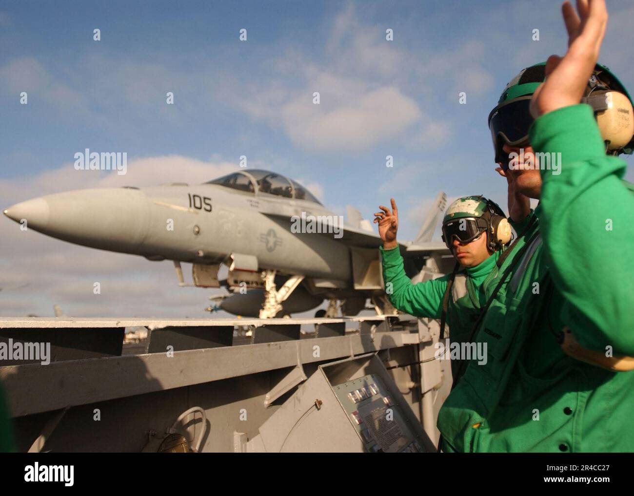 US Navy Catapult safety observers give the go ahead for an F-A-18F ...
