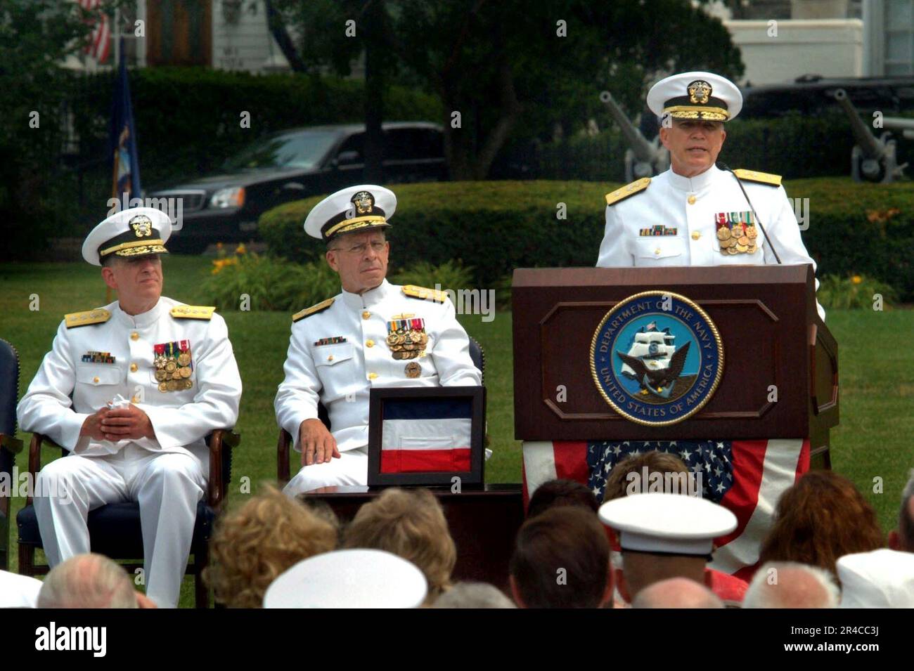 US Navy Rear Adm. Robert F. Burt makes remarks as he takes over as the ...