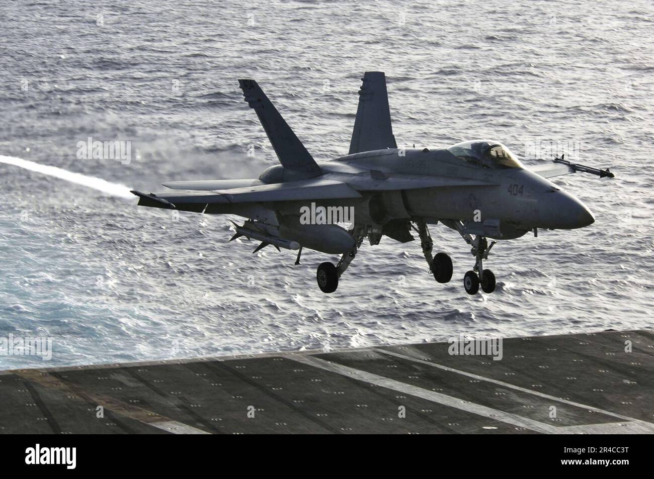 US Navy An F-A-18C Hornet assigned to Strike Fighter Squadron One Nine ...