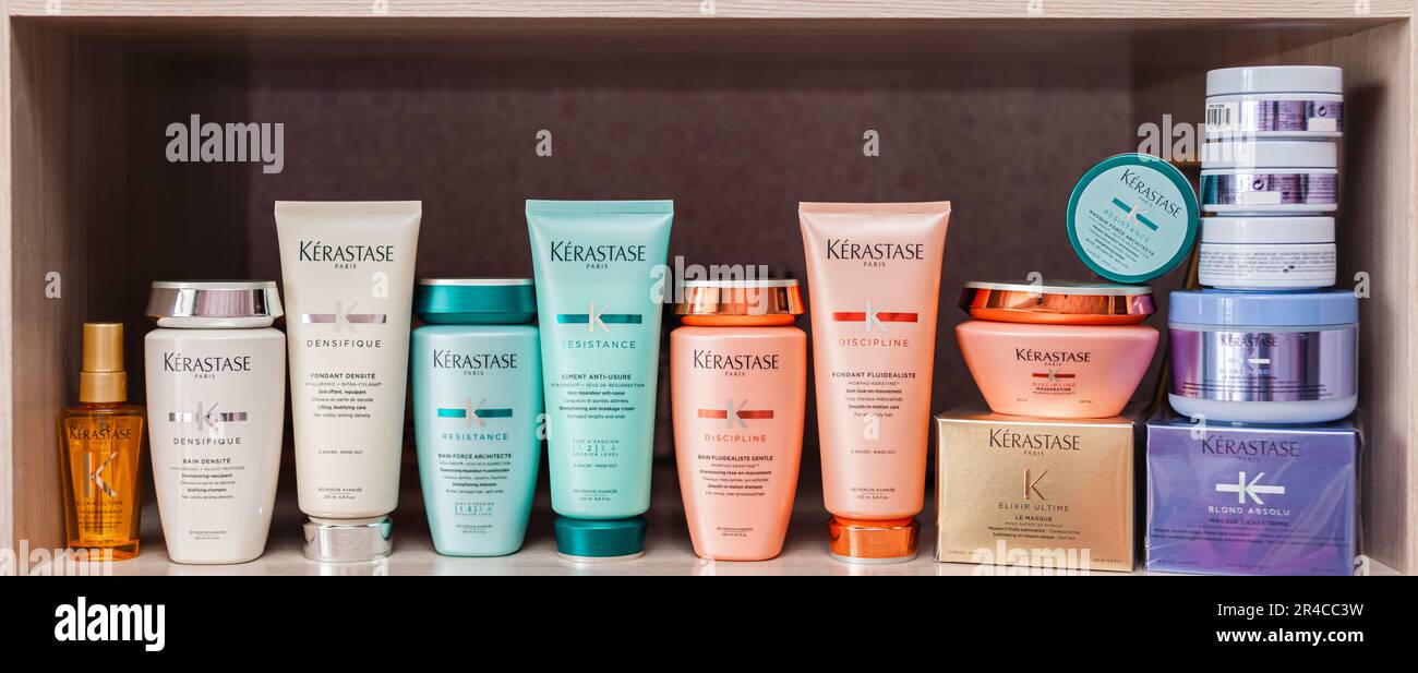 Many different jars of shampoo, hair care balms on the shelf. Jars and ...