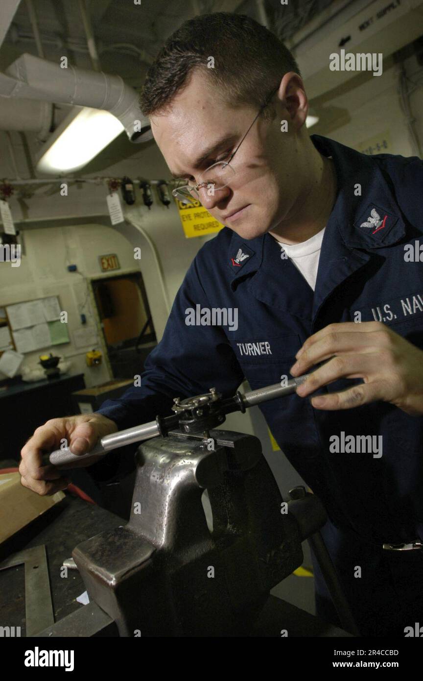 US Navy Aviation Structural Mechanic 3rd Class fabricates new threads ...