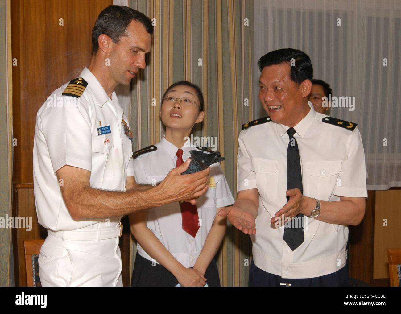 US Navy Rear Adm. Wang Deding, right, commander, Shanghai Naval Base ...