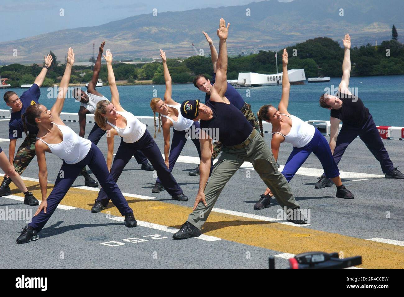 US Navy Gilad of the Fit TV show, Bodies in Motion, films a show aboard ...