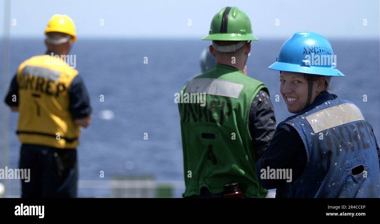 US Navy Seaman right, mans the phone and distance line on the flight ...